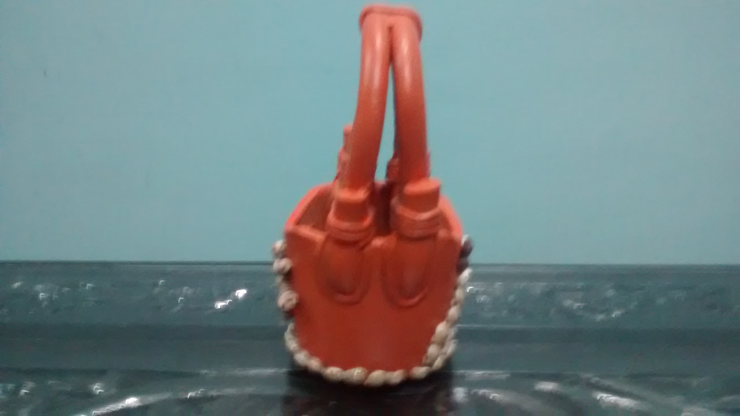 Pottery basket with shell work