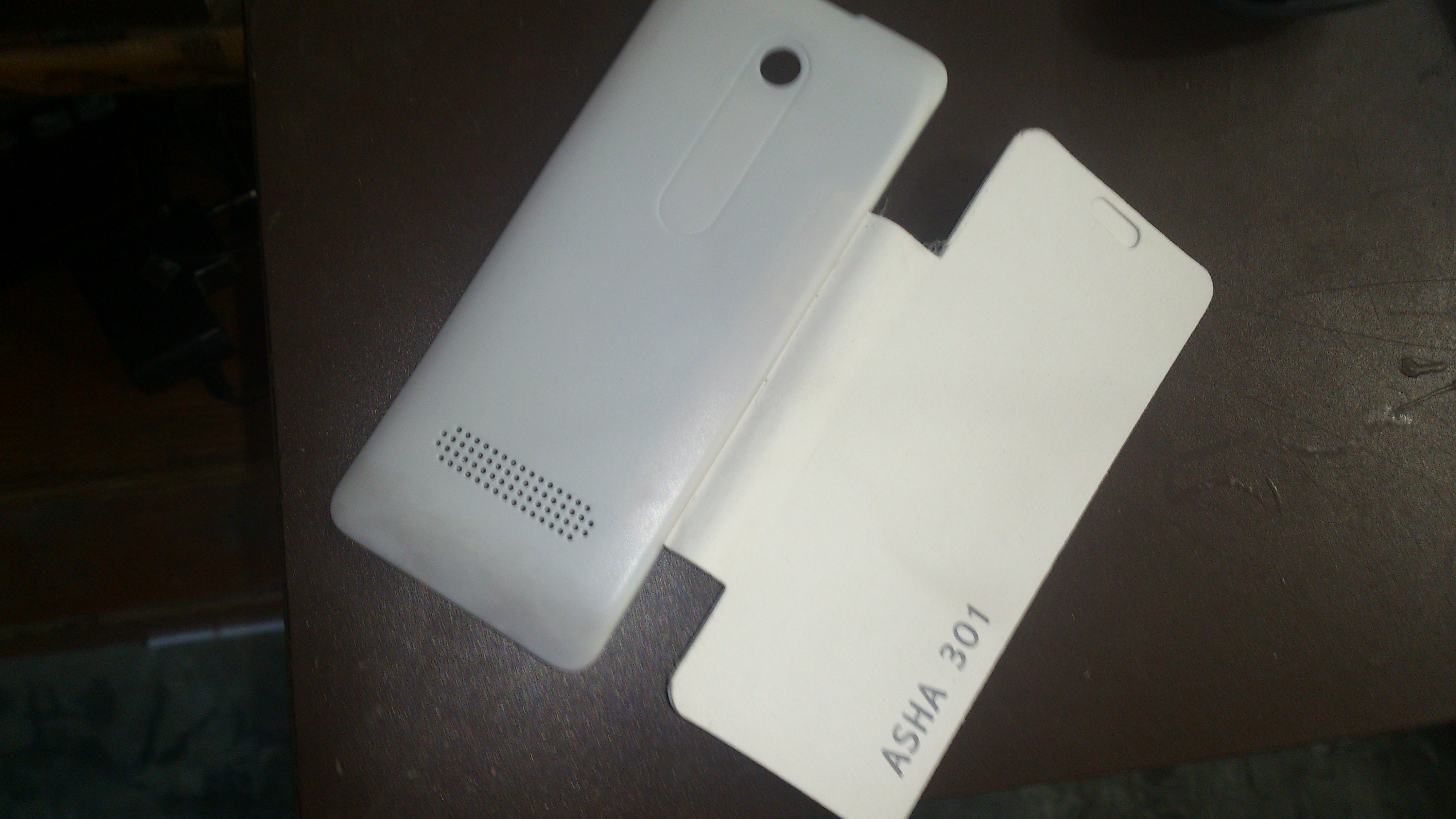 Online Nokia Asha 301 Flip Cover White Prices - Shopclues India