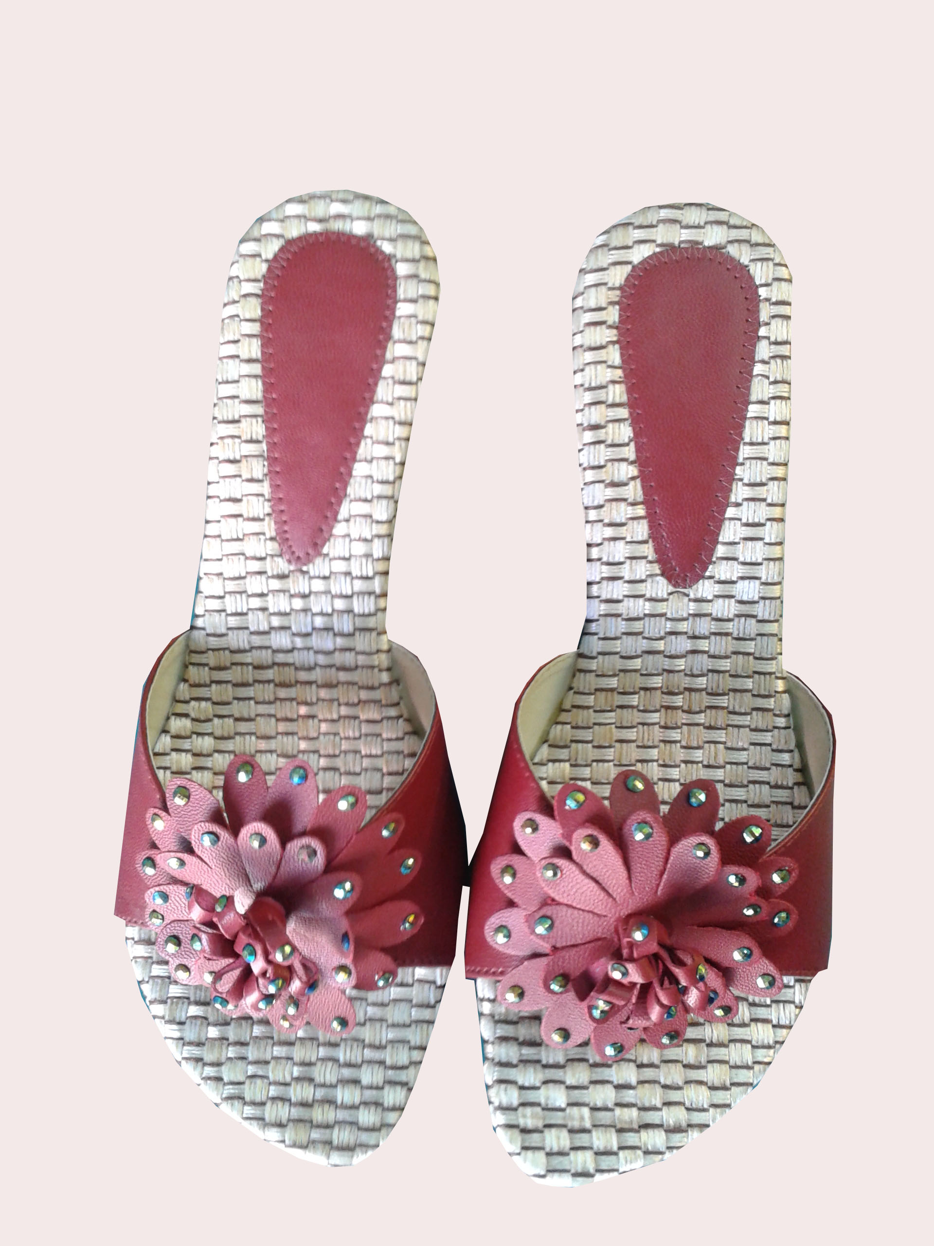 RED COLOURED FLOWERED DESIGNER SLIPPER FOR LADIES.